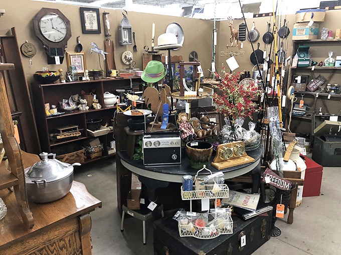 This booth looks like your coolest grandparent's attic exploded in the most organized way possible. That green hat is practically begging for a second life at your next dinner party.