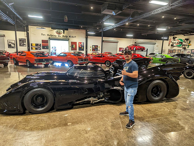 The Batmobile's sophisticated cousin makes an appearance. This sleek black beast looks ready to outrun even your most ambitious speeding ticket.