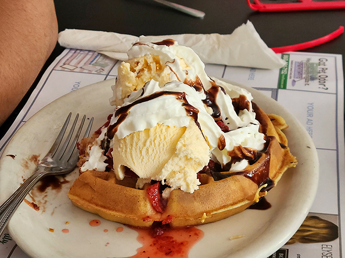 Dessert or breakfast? When a waffle comes topped with ice cream and chocolate sauce, the correct answer is "Yes, please!"
