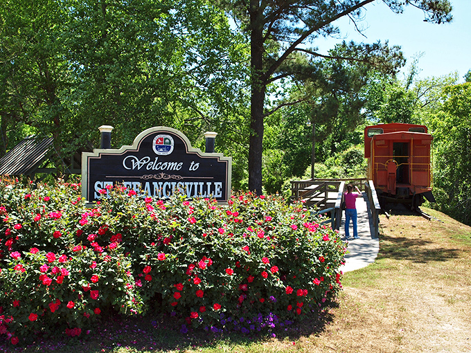 Welcome signs that actually mean it. St. Francisville greets visitors with blooming roses and a vintage caboose&mdash;because Southern hospitality deserves a proper introduction.