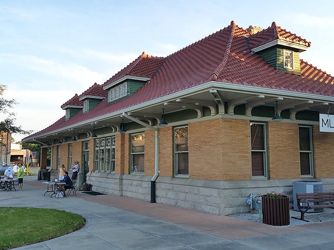 The meticulously restored Wysor Street Depot stands as a testament to Muncie's railroad heritage, its distinctive red roof a beacon to history buffs.