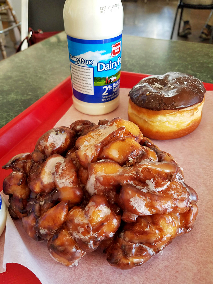 The perfect Idaho breakfast trinity: farm-fresh milk, chocolate-frosted perfection, and an apple fritter the size of Rhode Island.