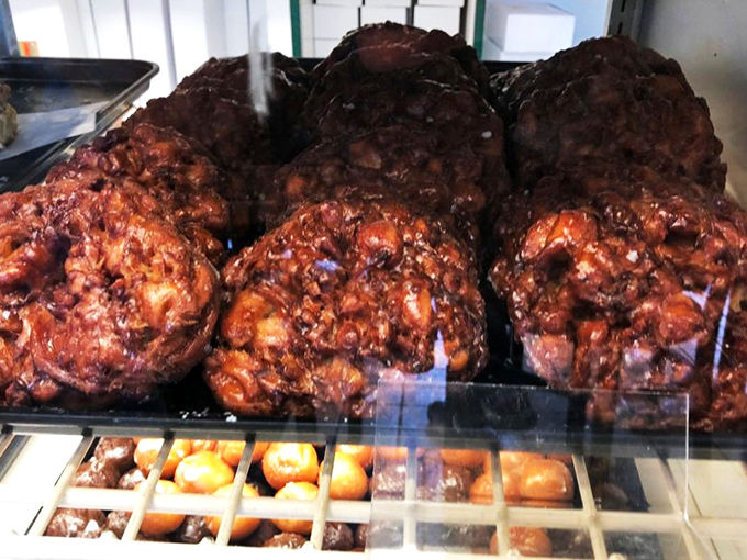 These aren't just apple fritters&mdash;they're edible monuments to what happens when dough meets apple with serious intentions. The size alone deserves its own zip code.