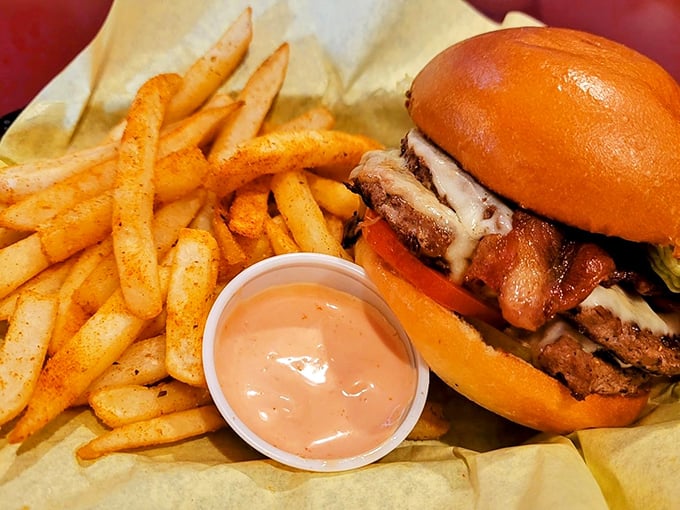 A burger that requires a game plan before the first bite. The structural engineering alone deserves a standing ovation.