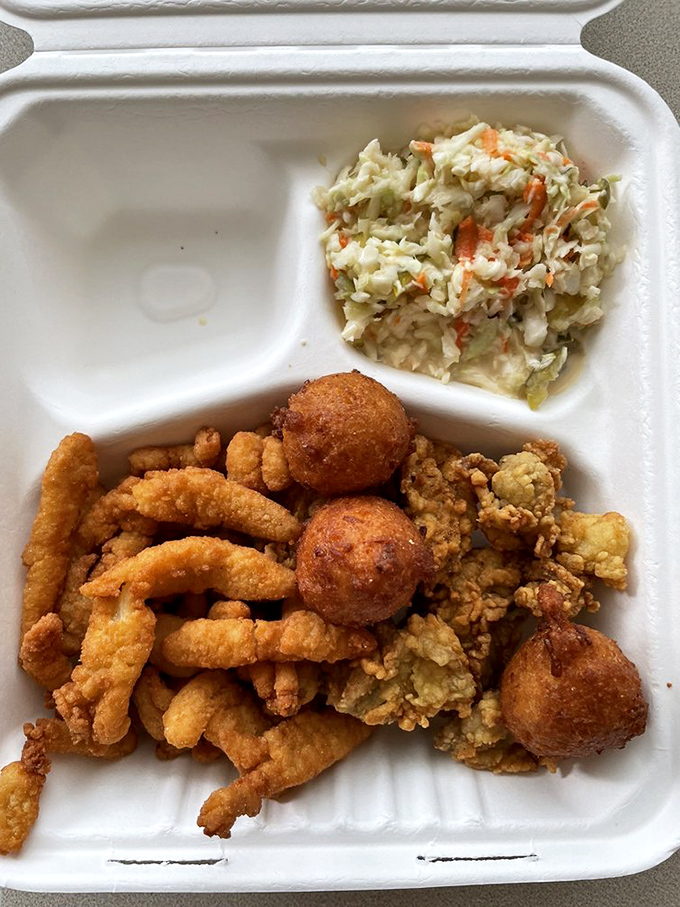 Not all heroes wear capes&mdash;some come in foam containers with coleslaw and hush puppies. This seafood sampler is what vacation memories are made of.