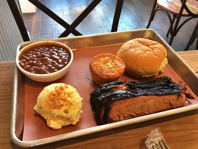 A metal tray has never held such treasure&mdash;brisket with that perfect black edge, potato salad, and beans that didn't come from any can.