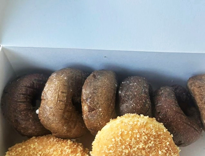 Dark as midnight and twice as mysterious, these chocolate cake donuts aren't just a breakfast&mdash;they're a declaration of your right to joy.