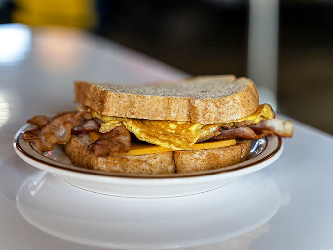 Breakfast sandwiches should always look like this&mdash;gloriously overstuffed with eggs and bacon, ready to cure whatever ailed you the night before.