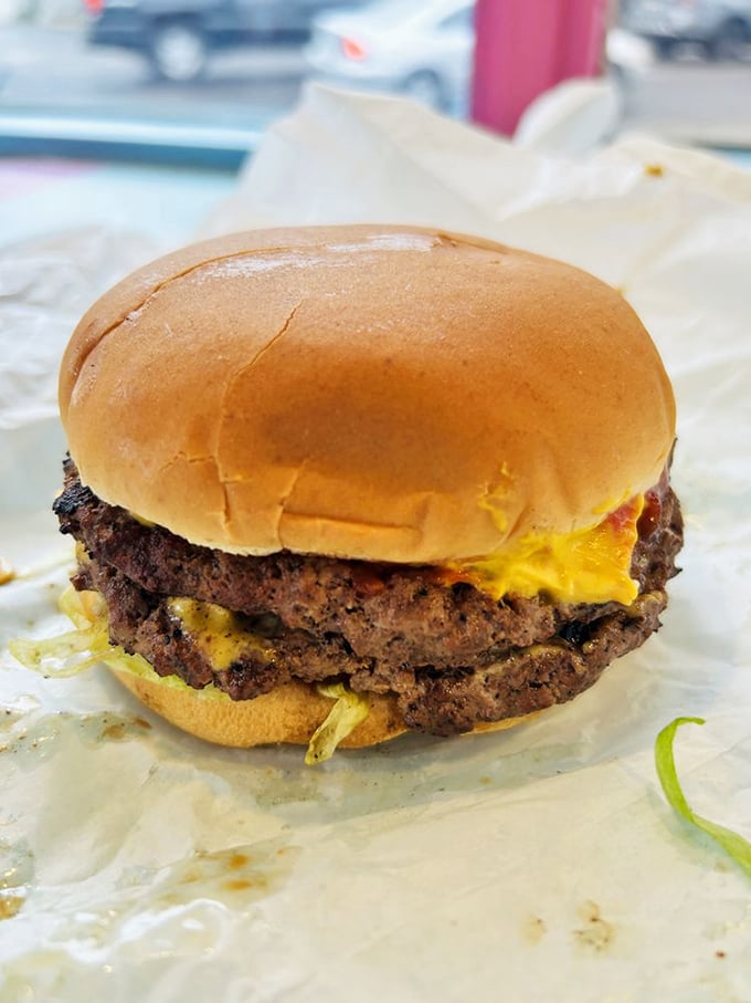 The perfect burger doesn't need to show off. It just sits there confidently, knowing you're about to have a moment of pure joy that no trendy food can match.