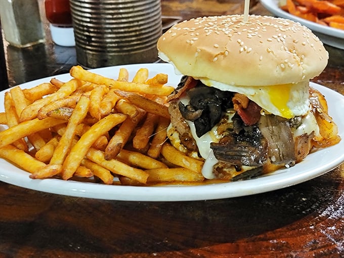 This isn't just a burger &ndash; it's a towering monument to excess, complete with a runny egg announcing "you'll need extra napkins" before you even take a bite.