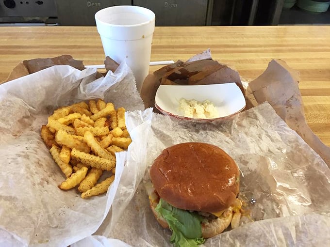 The holy trinity of American comfort food: a well-executed burger, crispy fries, and a frosty drink. Simple pleasures that never go out of style.