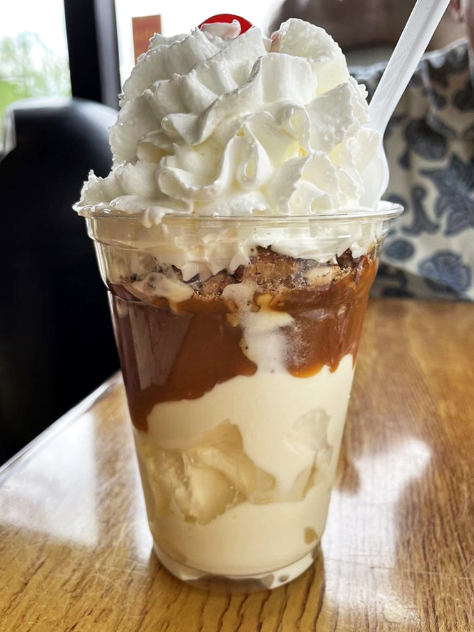 Caramel lovers, rejoice! This sundae is what would happen if Willy Wonka designed a skyscraper made entirely of sweet, gooey goodness.