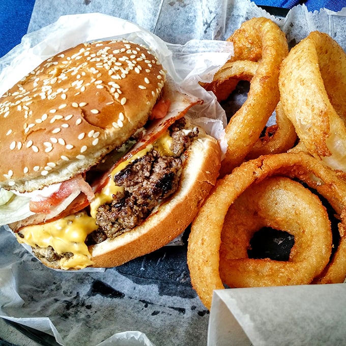 The marriage of a juicy burger and crispy onion rings proves some relationships are meant to last forever.