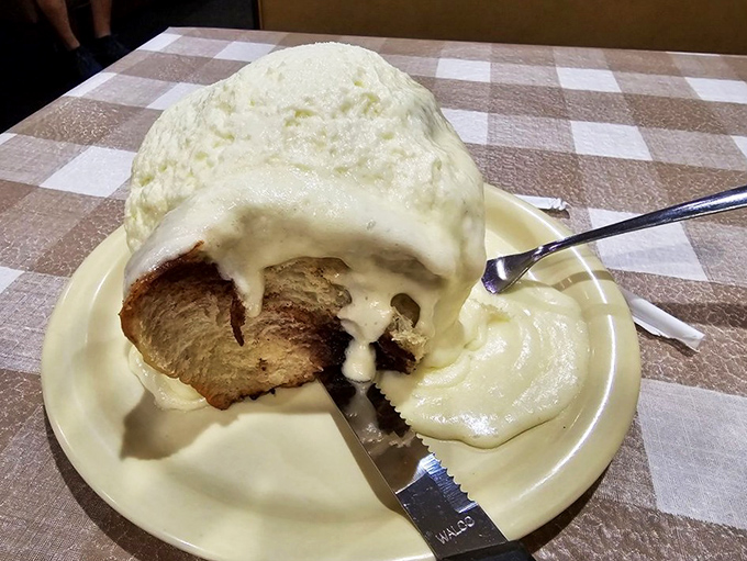 This isn't just dessert; it's architecture. The cinnamon roll's layers unfold like chapters in a delicious story you never want to end.