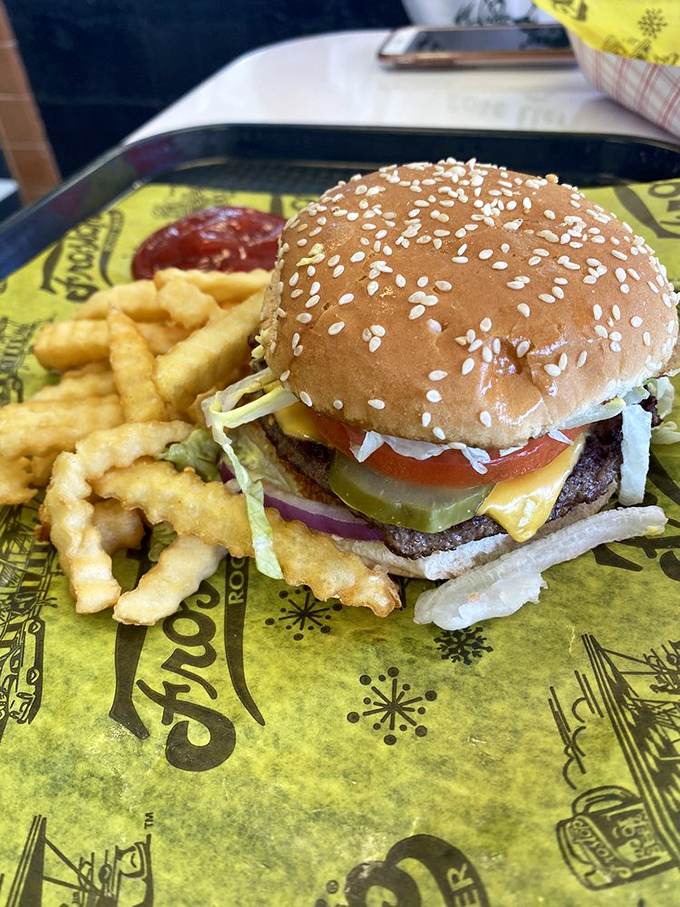 Layer by layer, this burger tells the story of American diner perfection: sesame bun, melty cheese, fresh veggies, and a patty cooked with respect.