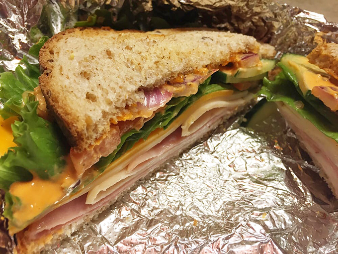 Layer upon layer of fresh ingredients stacked with the architectural precision of Frank Lloyd Wright, if he'd worked in sandwiches instead of houses.