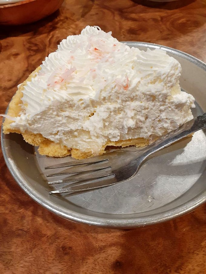 This coconut cream slice has the structural integrity of the Eiffel Tower and twice the artistry. Architecture you can eat!