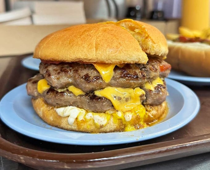 The double cheeseburger at Gus's doesn't just satisfy hunger&mdash;it obliterates it. Two beefy patties draped in melted American cheese create a towering monument to excess.
