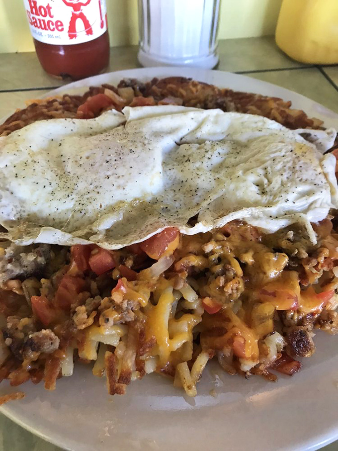 Behold: the mythical perfect hash. Those eggs draped over that meticulously seasoned mixture would make Michelangelo weep with artistic envy.