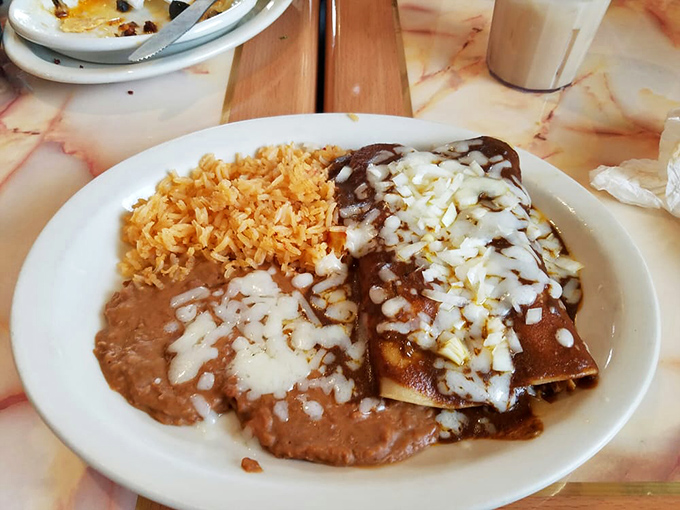 Mole sauce that's complex enough to need its own passport. Those enchiladas draped in that velvety brown sauce are worth crossing state lines for.