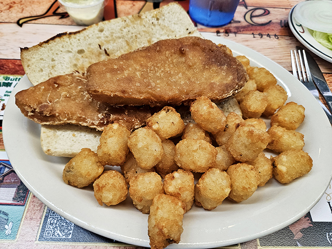 Simplicity perfected: a fish sandwich with tater tots. Proof that sometimes the most straightforward approach yields the most satisfying results.