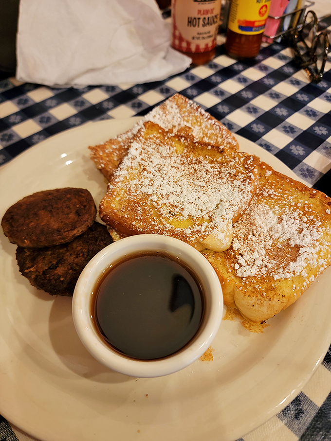 French toast that's dressed for success with powdered sugar and sausage on the side&mdash;breakfast's version of business casual.