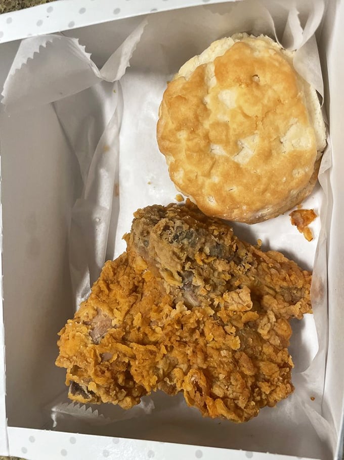 The holy trinity of Southern comfort: perfectly fried chicken, a golden biscuit, and the promise that diet resolutions can always start tomorrow.