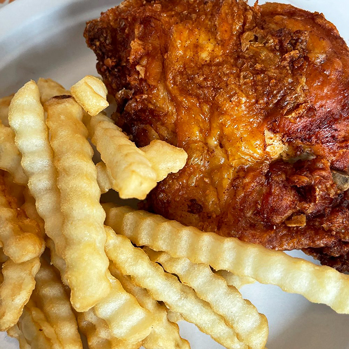 A plate that understands balance: crispy chicken, creamy mac and cheese, and baked beans. The holy trinity of comfort food, Pennsylvania-style.