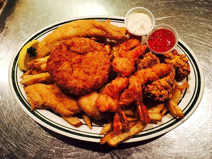 The seafood sampler that makes decision-making obsolete. Why choose between crab cake, catfish, and shrimp when you can have the holy trinity?