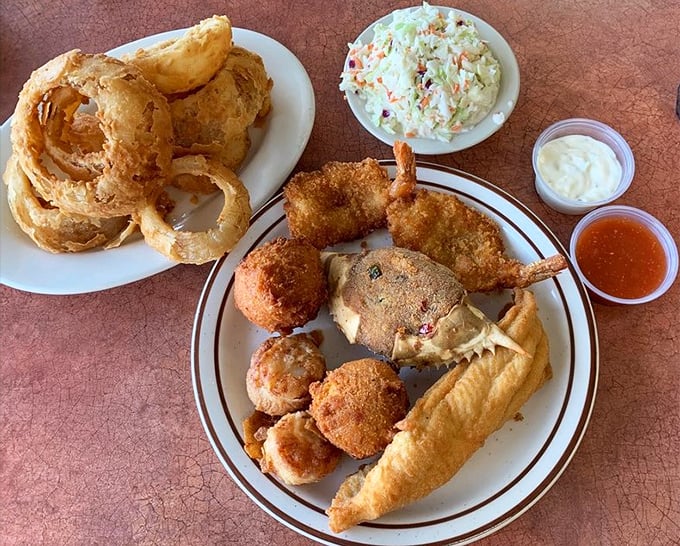 The seafood platter arrives like a greatest hits album&mdash;onion rings, hush puppies, and fried treasures from the deep.
