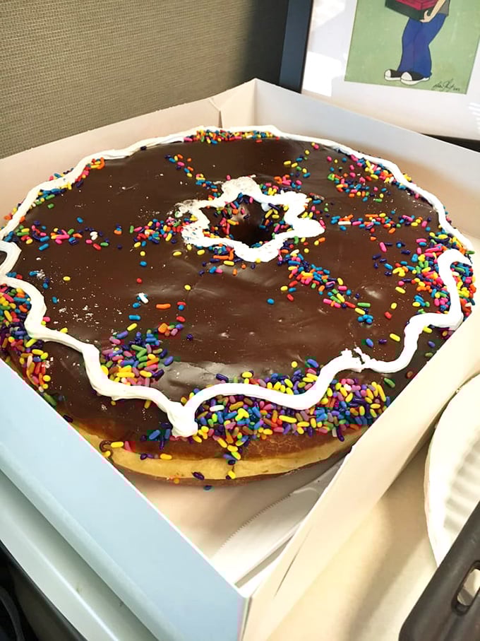The giant donut isn't compensating for anything&mdash;it's simply living its truth as the Godzilla of breakfast pastries.