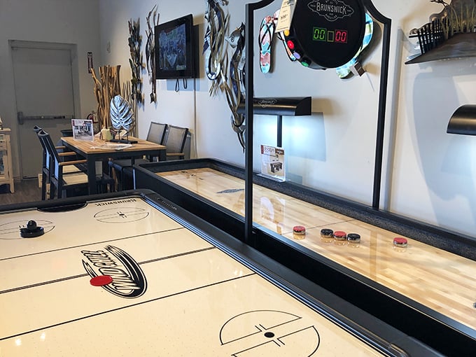 Game night just got serious! This shuffleboard and air hockey setup proves Johnny Janosik isn't just about sitting&mdash;it's about living.