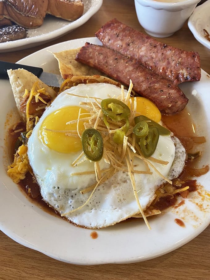 Sunny-side up eggs crowned with jalape&ntilde;os and melted cheese&mdash;this Tex-Mex breakfast masterpiece is Houston on a plate.