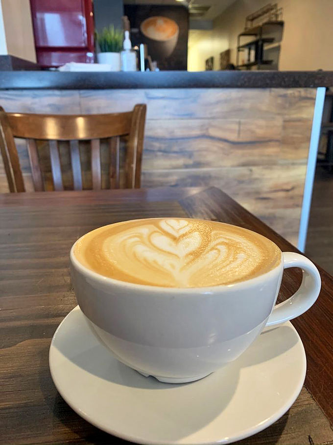 Coffee with a view&mdash;of more coffee. This heart-topped latte sits pretty against the backdrop of 29th Parallel's rustic wooden counter.