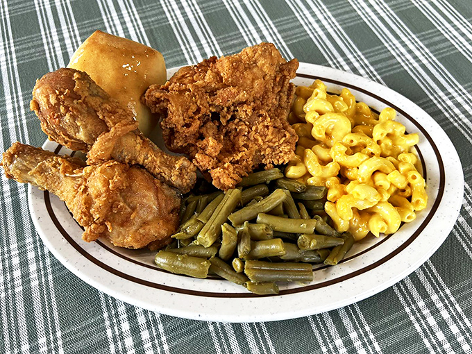 The holy trinity of Southern comfort &ndash; golden fried chicken, mac and cheese that's actually cheesy, and green beans that never saw the inside of a can.