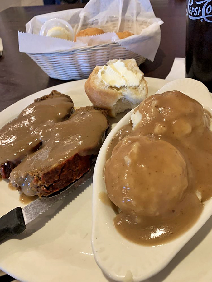 Meatloaf and mashed potatoes swimming in gravy&mdash;the kind of plate that makes you want to call your mother and apologize for ever leaving home.
