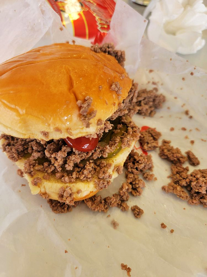 The original Maid-Rite in its natural habitat&mdash;wrapped in paper, surrounded by escapee meat morsels that seasoned veterans know not to waste.