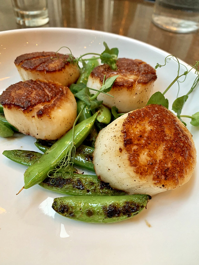 Four perfectly seared scallops standing guard over charred snow peas. It's like the seafood equivalent of finding a waterfall in the desert&mdash;unexpected and absolutely worth the journey.