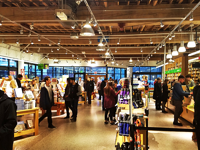 The evening crowd mingles under warm lighting, hunting treasures. It's cocktail hour for book lovers&mdash;intoxication guaranteed, no hangover.