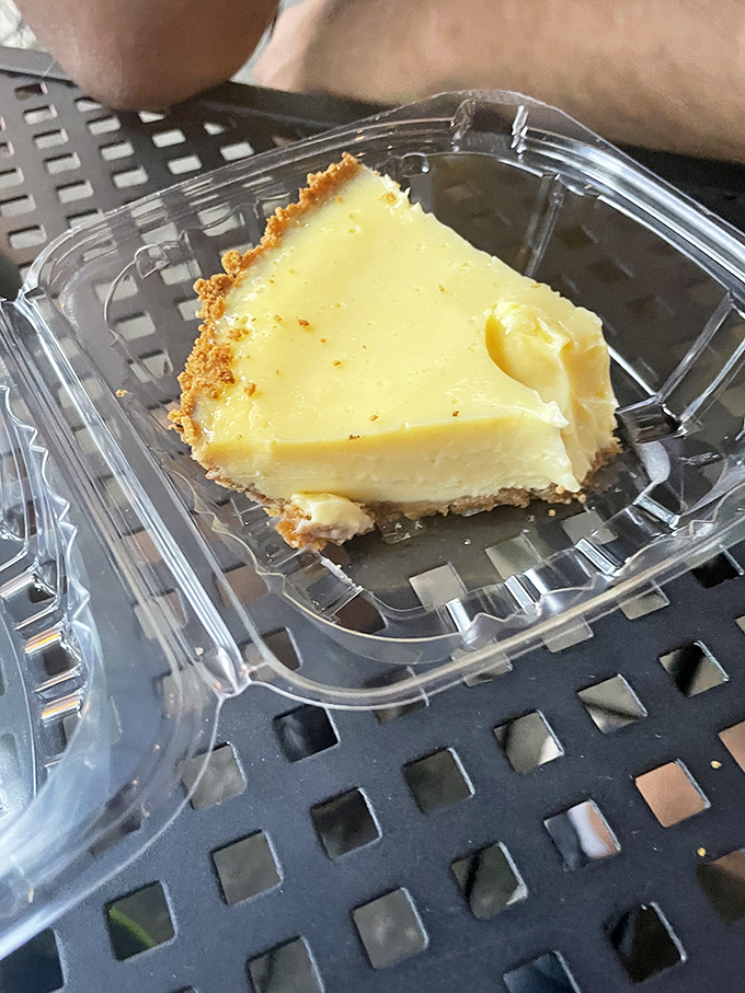 This slice of key lime heaven comes in a humble plastic container, proving great food doesn't need fancy packaging&mdash;just impeccable execution.