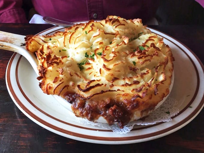 Each golden ridge of potato is a crispy sentinel guarding the rich, savory filling beneath &ndash; comfort food architecture at its finest.