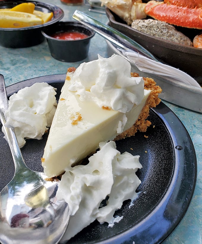 Key lime pie so good it might start family feuds. That dollop of whipped cream isn't decoration&mdash;it's the exclamation point on a perfect citrus sentence.
