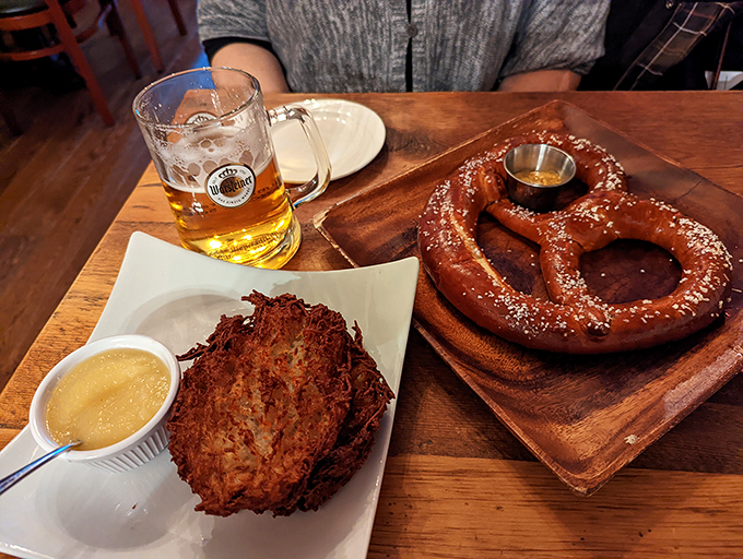 A golden pretzel alongside a crispy potato pancake&mdash;proof that sometimes the perfect relationship comes with mustard on the side.