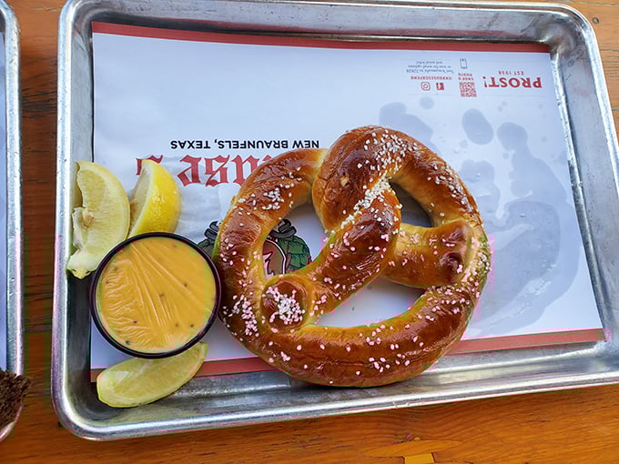 This isn't just a pretzel; it's edible architecture with a side of sunshine-yellow mustard that'll make your taste buds yodel with joy.