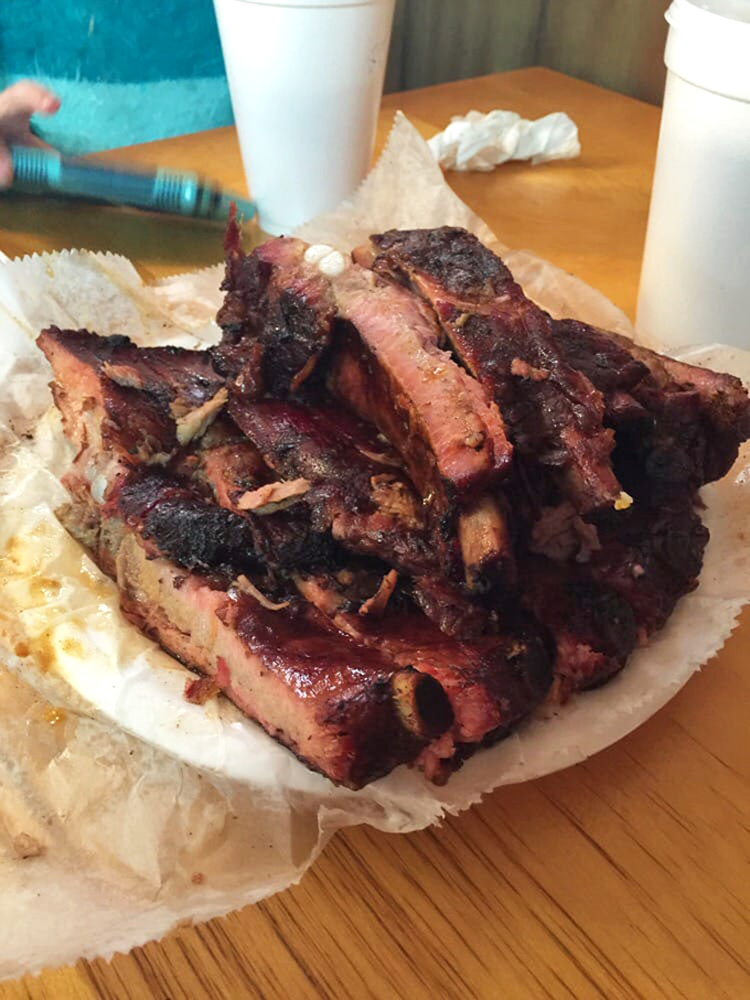 This isn't just a plate of ribs&mdash;it's edible evidence that patience and smoke create magic that no microwave or shortcut ever could.