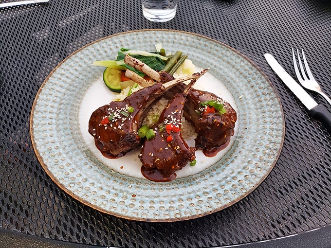 These lamb chops aren't just dinner; they're tiny meat lollipops for grown-ups. The glaze glistens with promise.