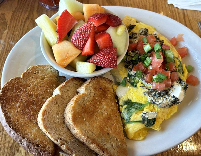 This isn't just an omelet&mdash;it's a vegetable garden wrapped in fluffy eggs, with toast sturdy enough to handle the journey from plate to mouth.