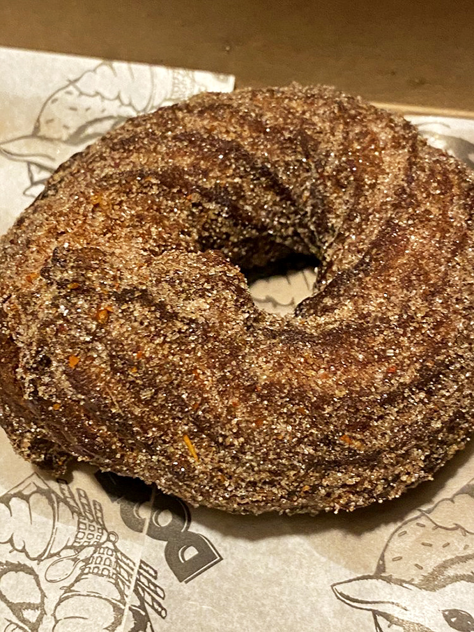 The pink beauty isn't just wearing sprinkles&mdash;it's wearing attitude. This donut doesn't ask for attention; it commands it with every vibrant bite.