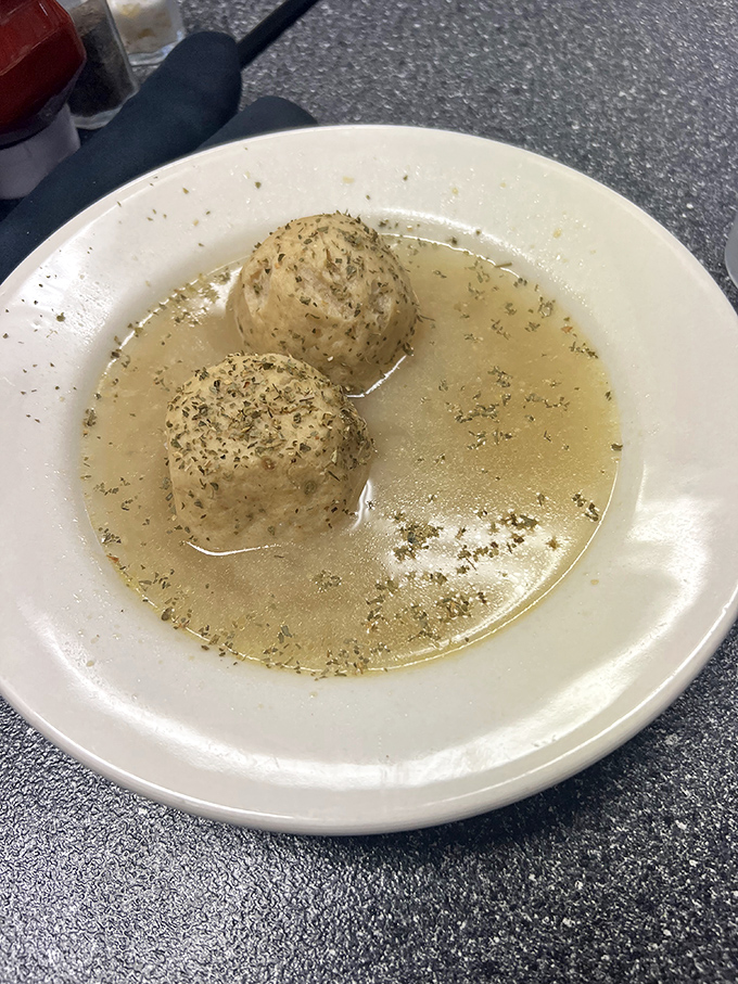 Double the matzo balls, double the joy. These perfect dumplings are the penicillin of the soul, no prescription needed.
