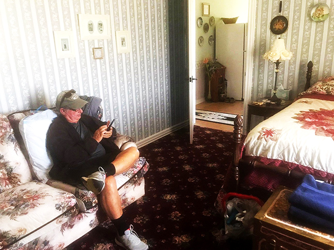 When knights need to check their messages&mdash;a guest relaxes in period-appropriate surroundings with decidedly modern technology. Medieval comfort meets Wi-Fi in this cozy chamber.